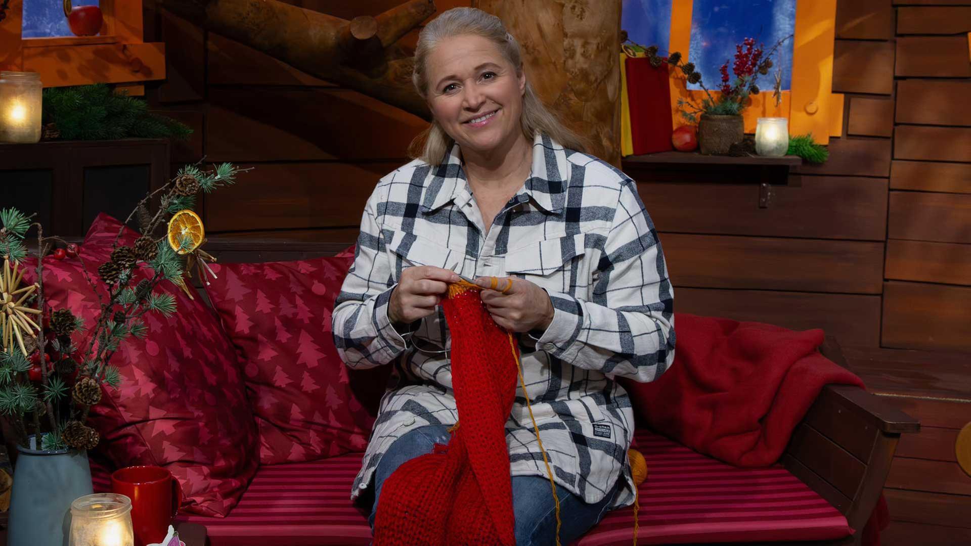 345. Singa strickt einen Schal